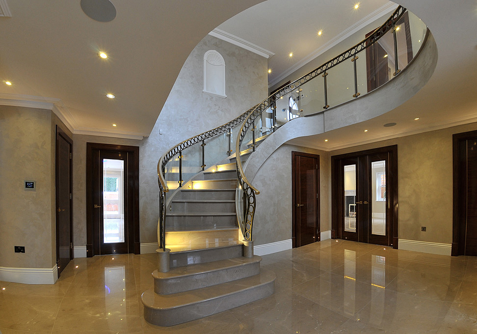 Russell Close - Marble clad Steel Helical Staircase with Brass Handrail ...