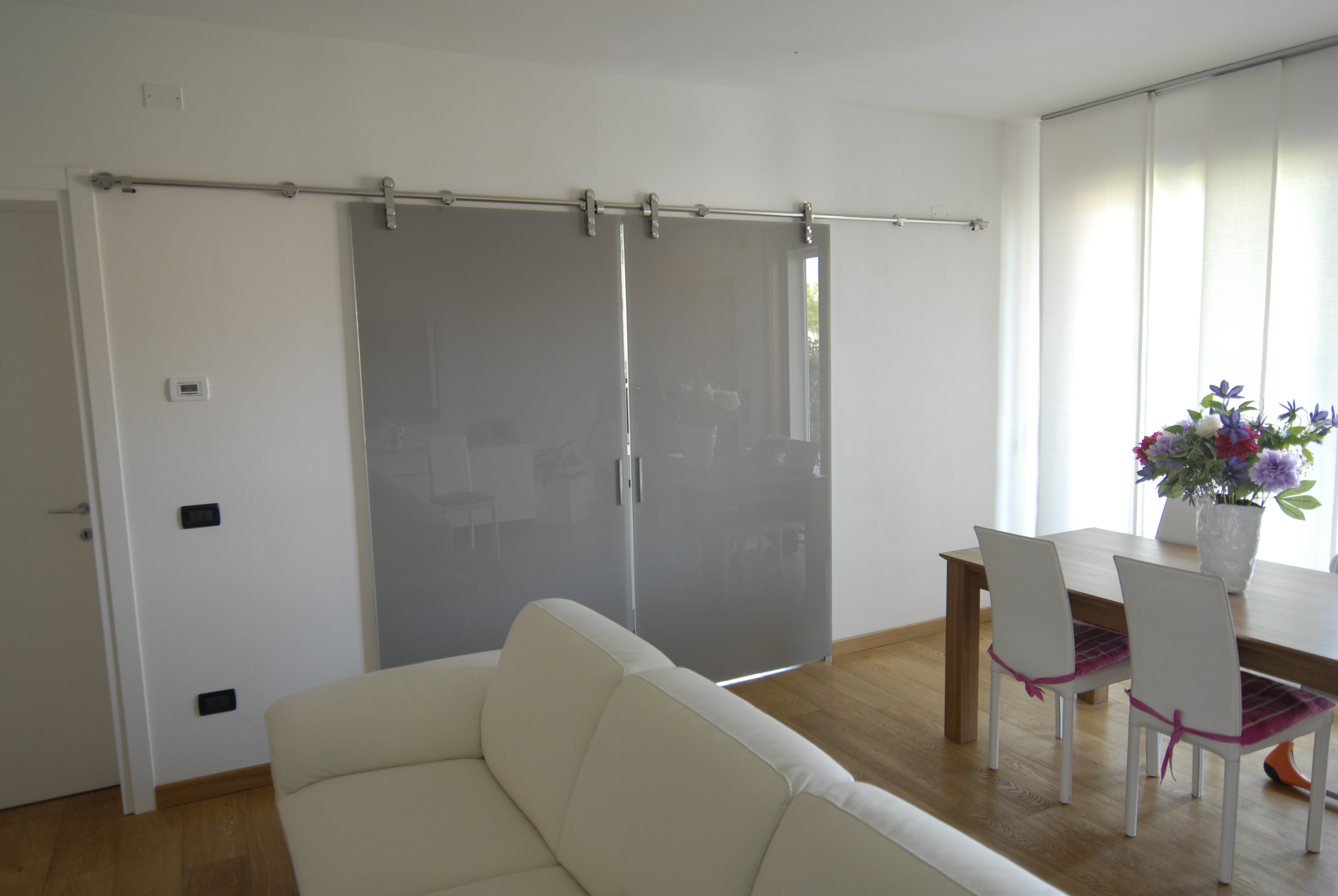 Back painted glass door by Vetroarredamento | Archello