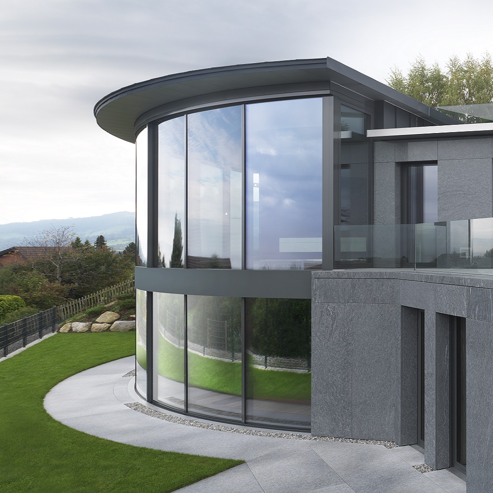 Curved frameless sliding windows van Air-Lux Technik AG | Archello