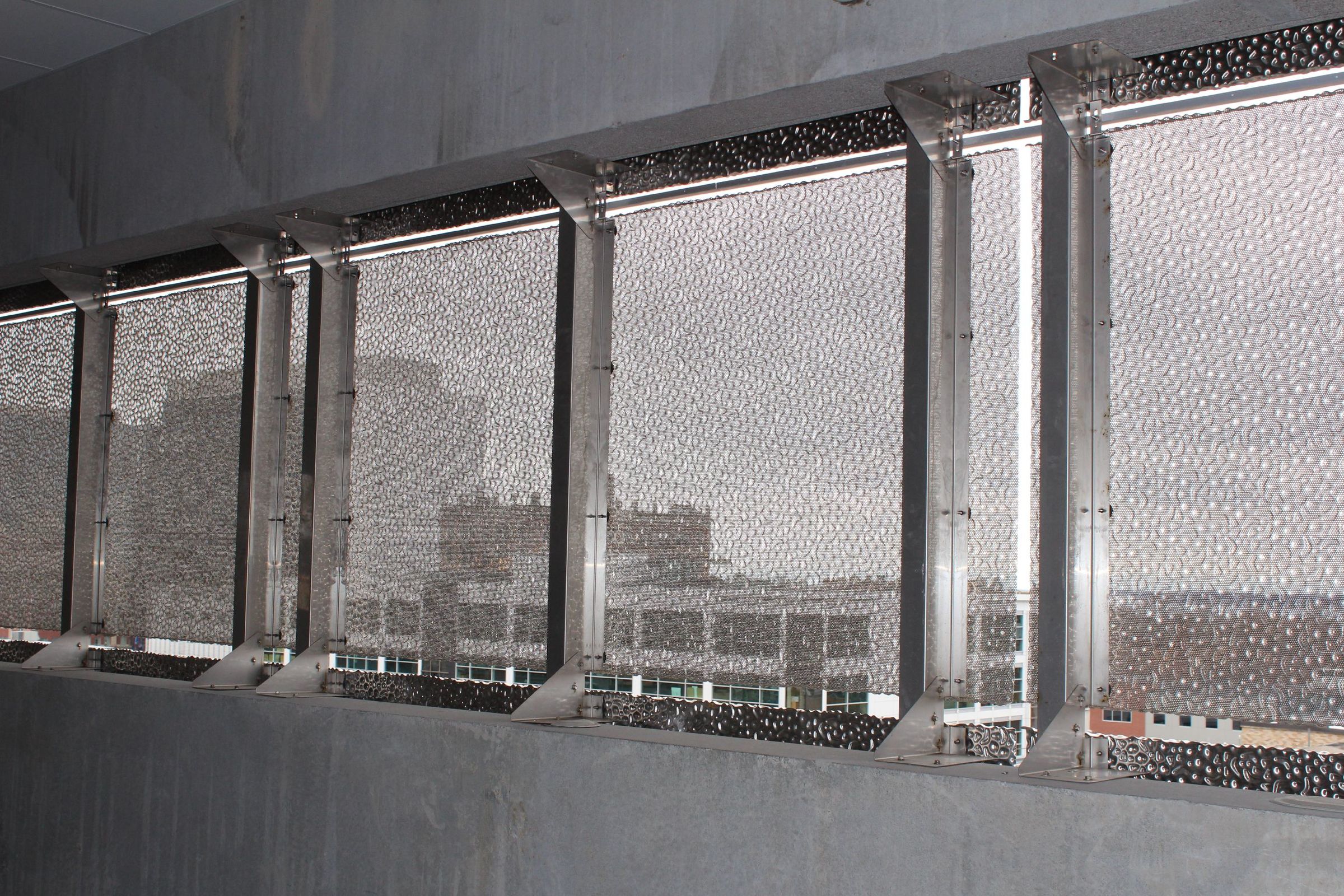Parking Ramp Security Screen by Rigidized Metals Corporation | Archello