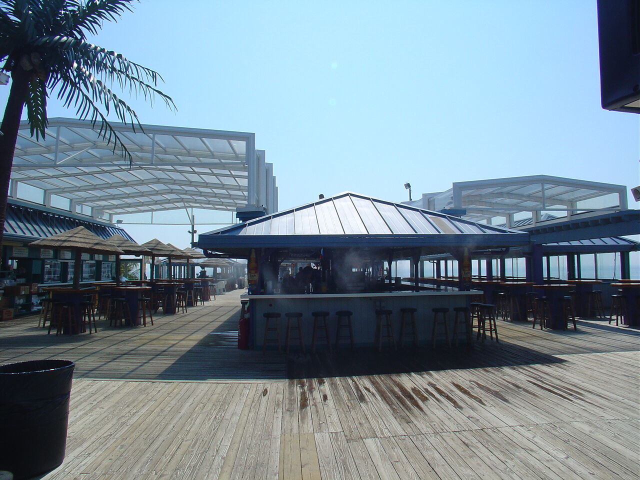 Martell s Tiki Bar Retractable Roofs Roll A Cover Intl Media Photos And Videos 1 martell-s-tiki-bar-retractable-roofs-roll-a-cover-intl-media-photos-and-videos-1