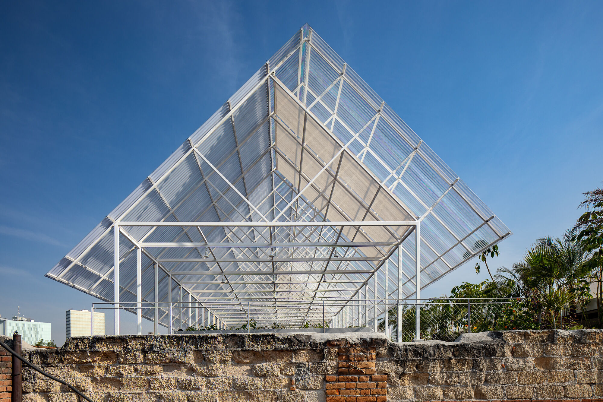 Spectacular lightweight canopy crowns the rooftop of a historic palace ...