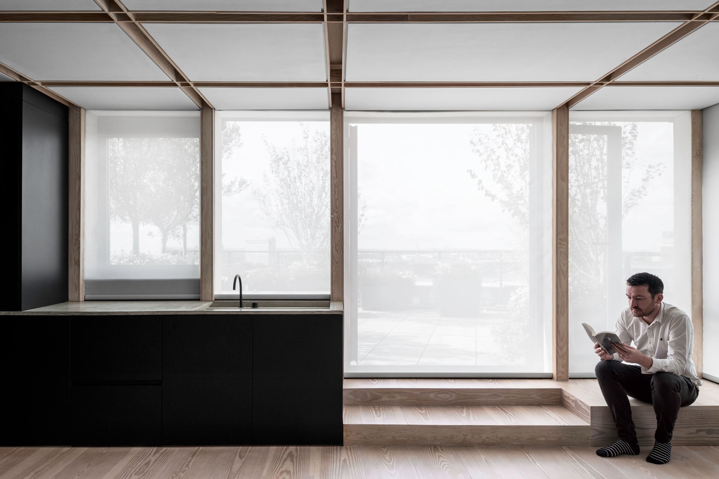 Levels 10 + 11 by Con I Form Architects features modern detailing ...