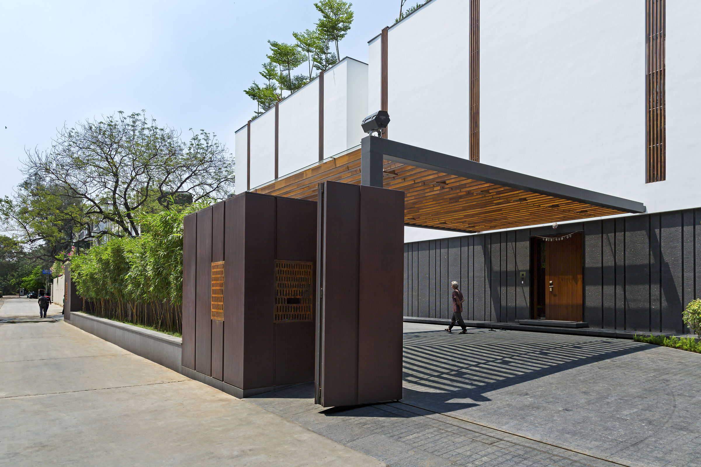 Twin cubes and a court | Studio Lotus | Archello