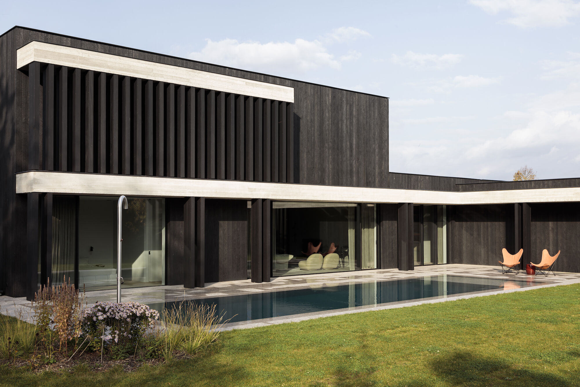 Villa RS by JUMA Architects employs charred wooden cladding and ...