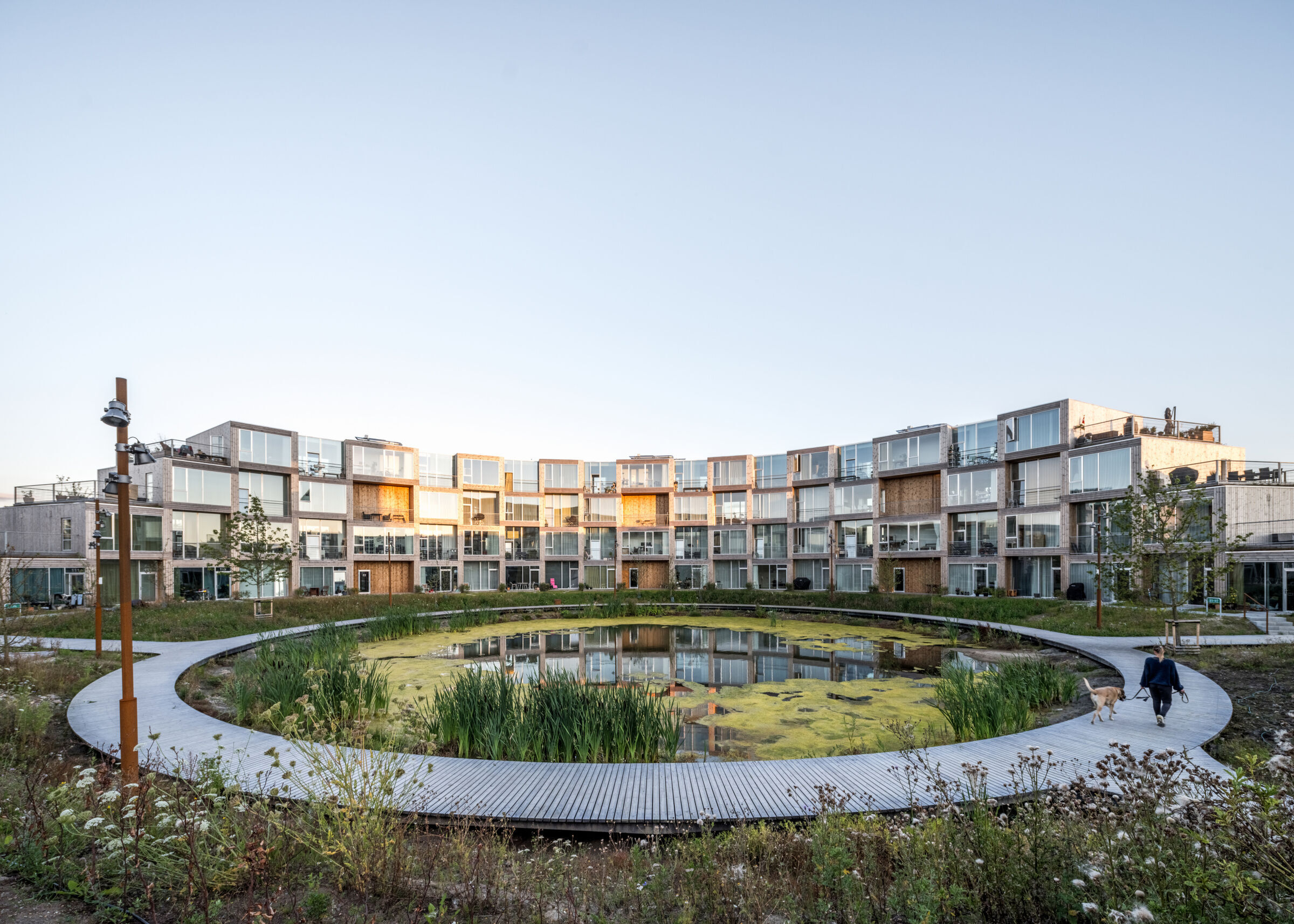 BIG designs spiral-shaped modular housing as a part of the master plan ...