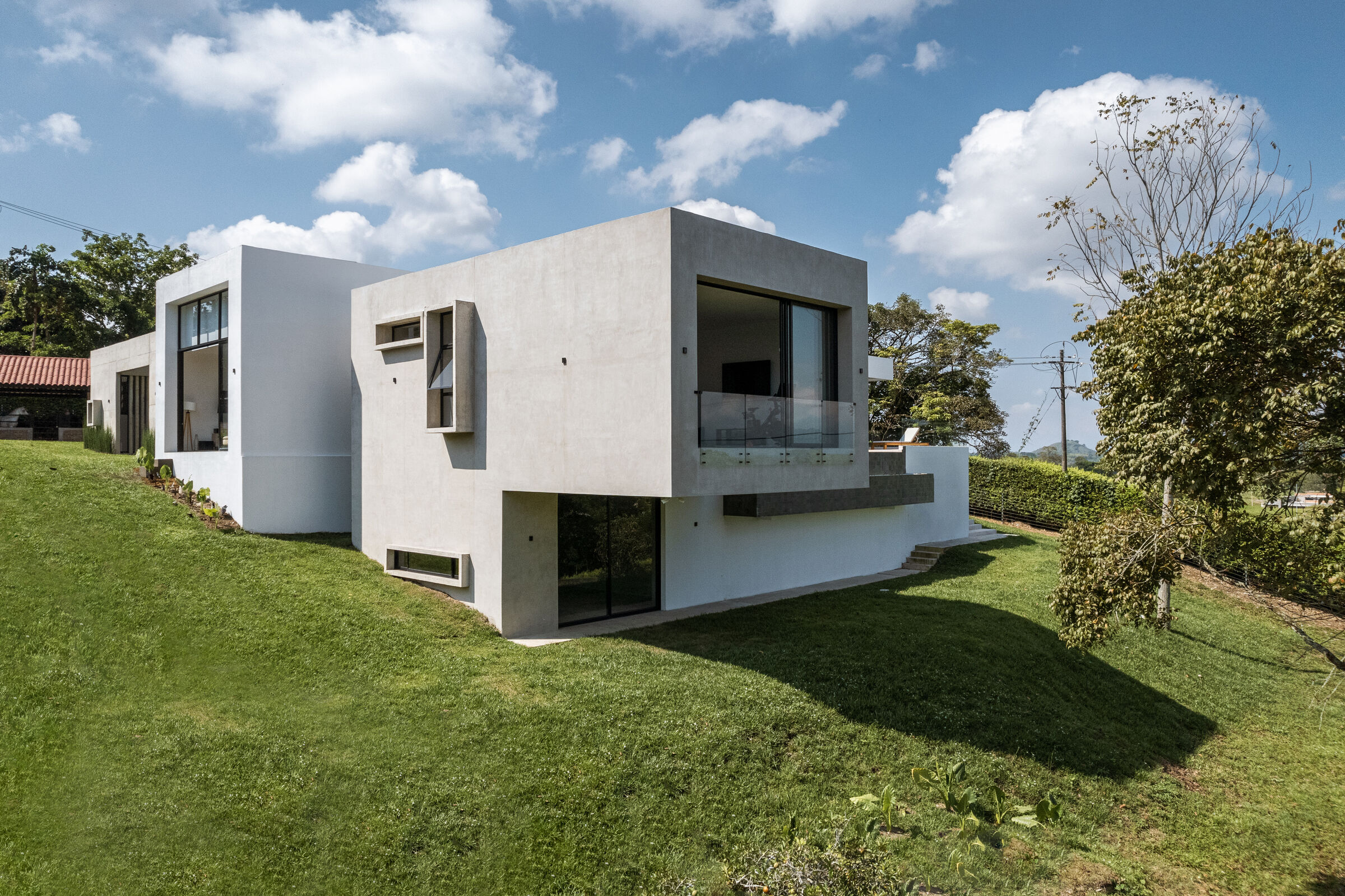 This concrete house in Columbia exemplifies minimalism through uniform ...