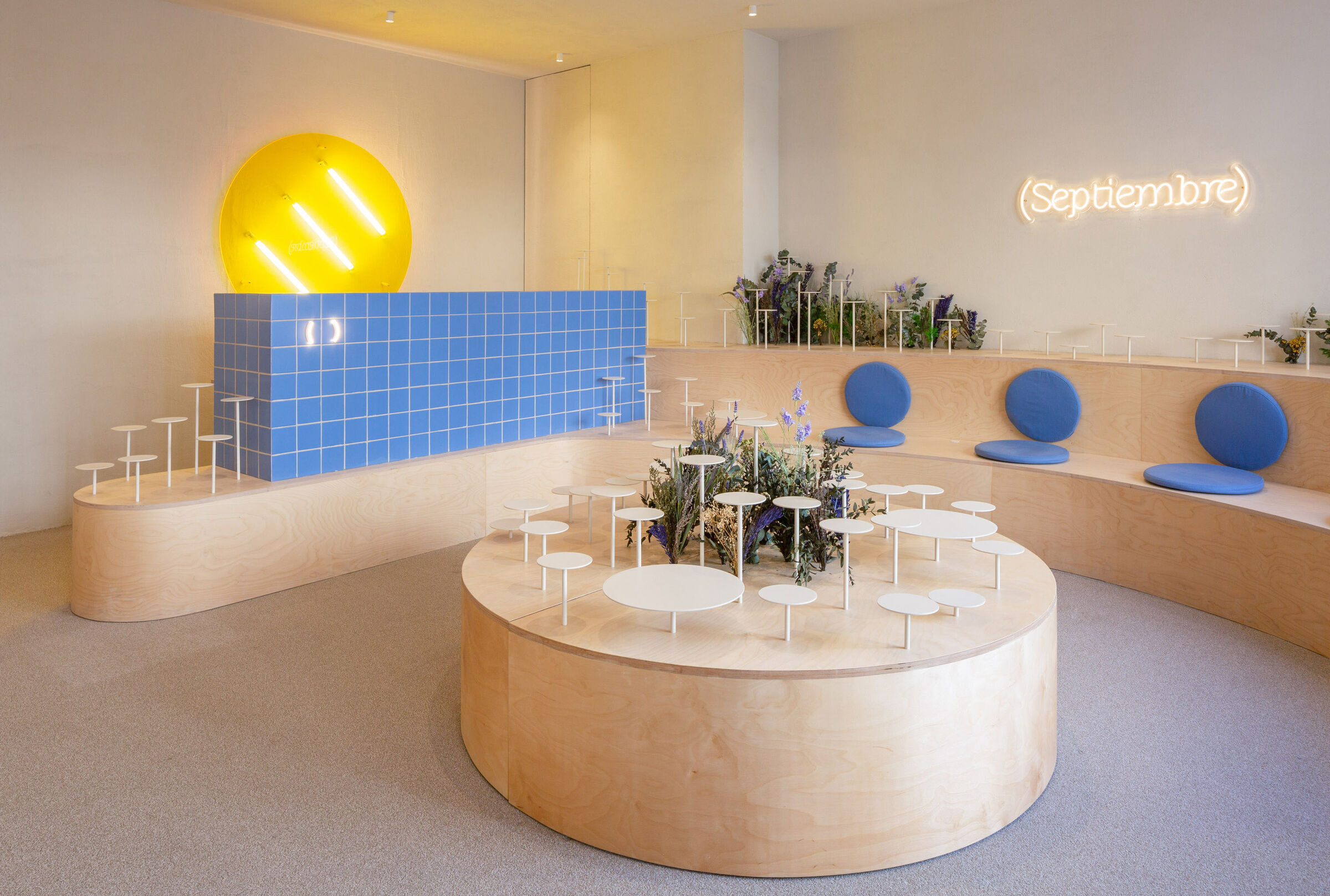 Conceptual flowers, natural wood and bold industrial finishes mark this ...