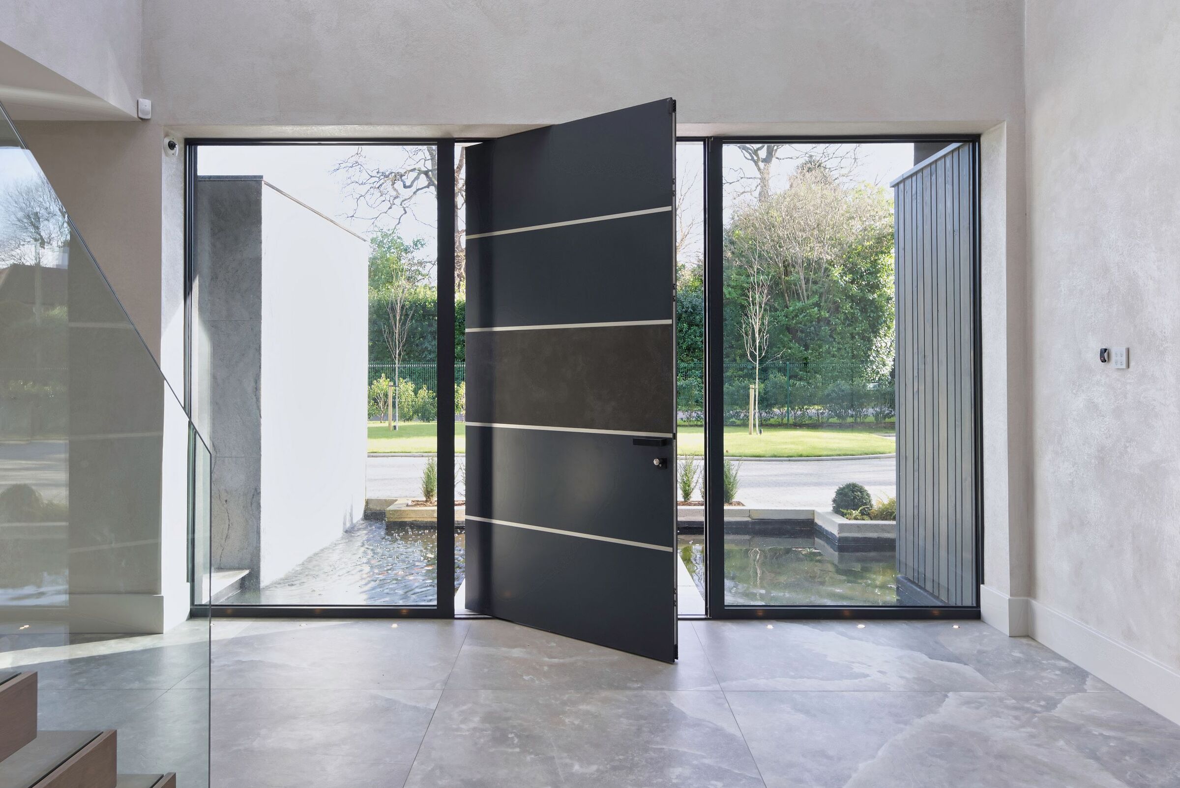 Apertio Solid Entrance Door by IQ Glass UK | Archello