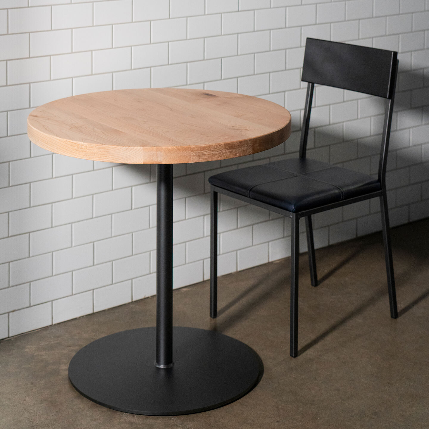 22″W Round Base Dining Table by Crow Works | Archello