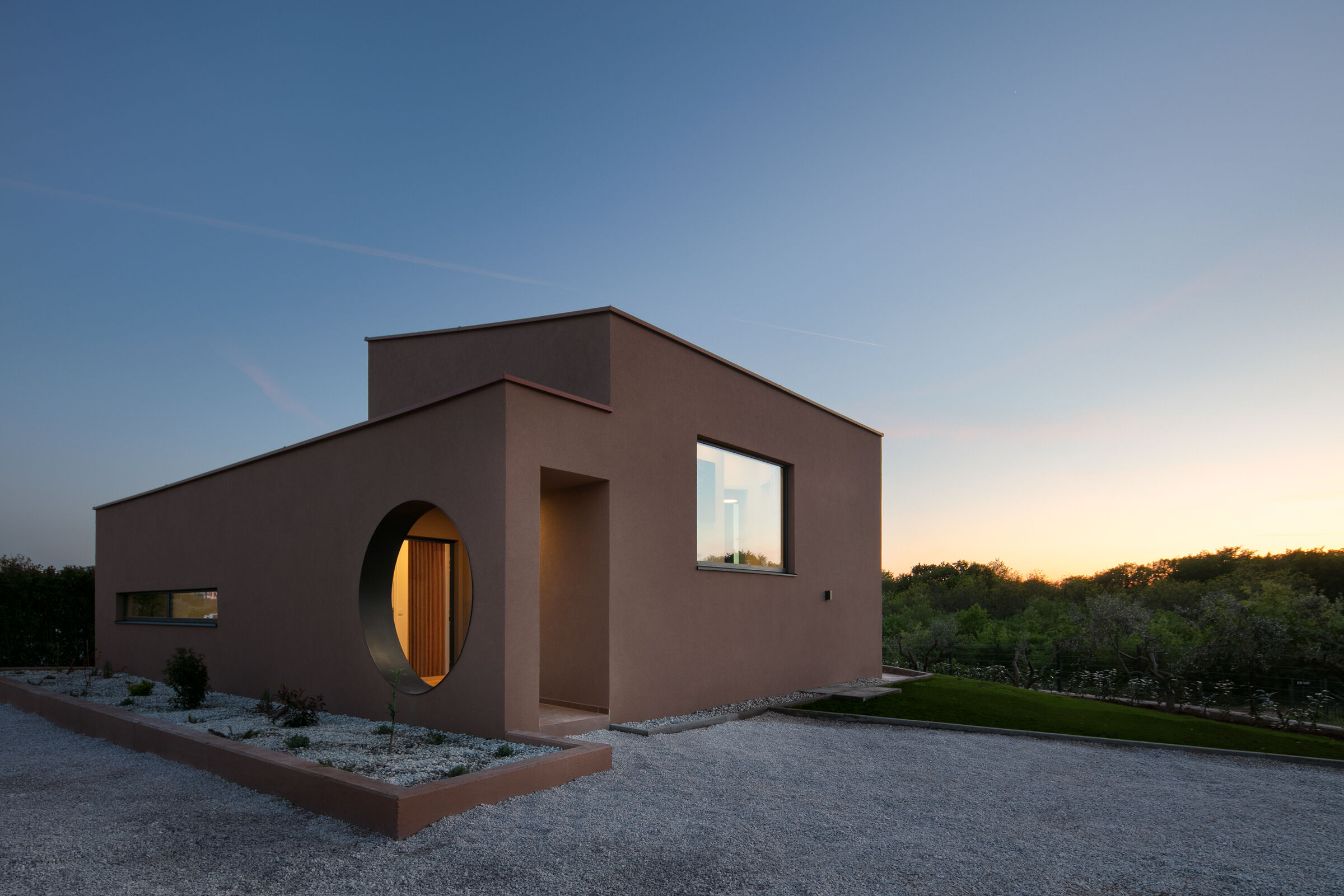 Red soil house | Konzola Arhitektura | Archello
