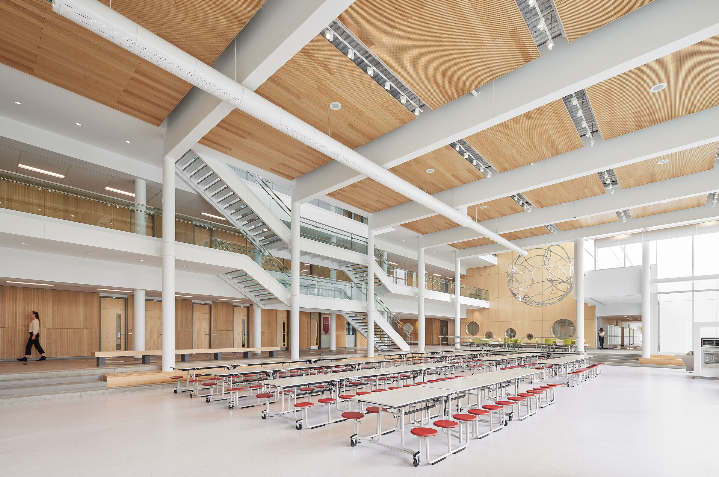 Bright, double-height atrium provides vibrant center of activity in ...